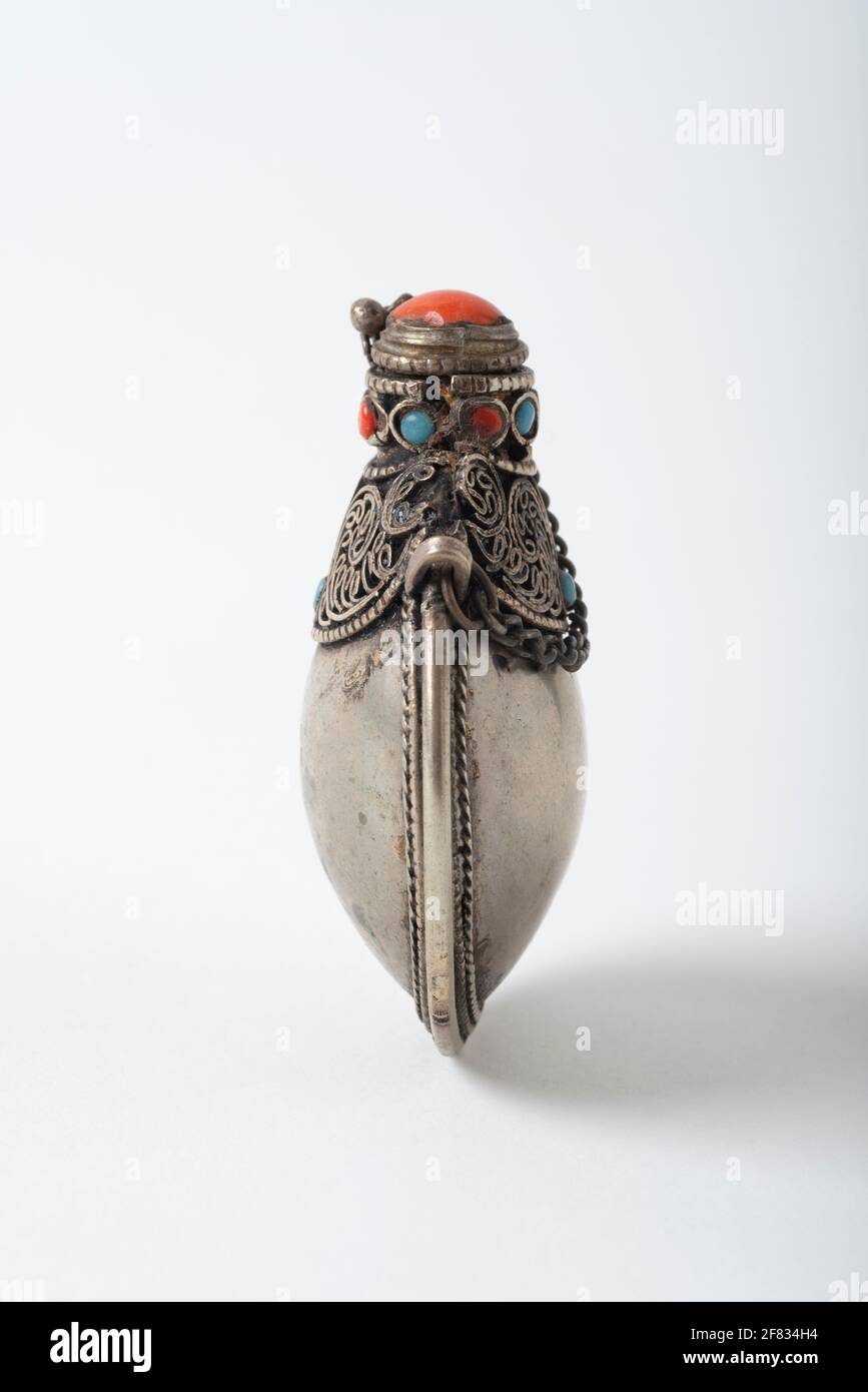 A small, antique snuff container collected in Bhutan, but of Tibetan ...