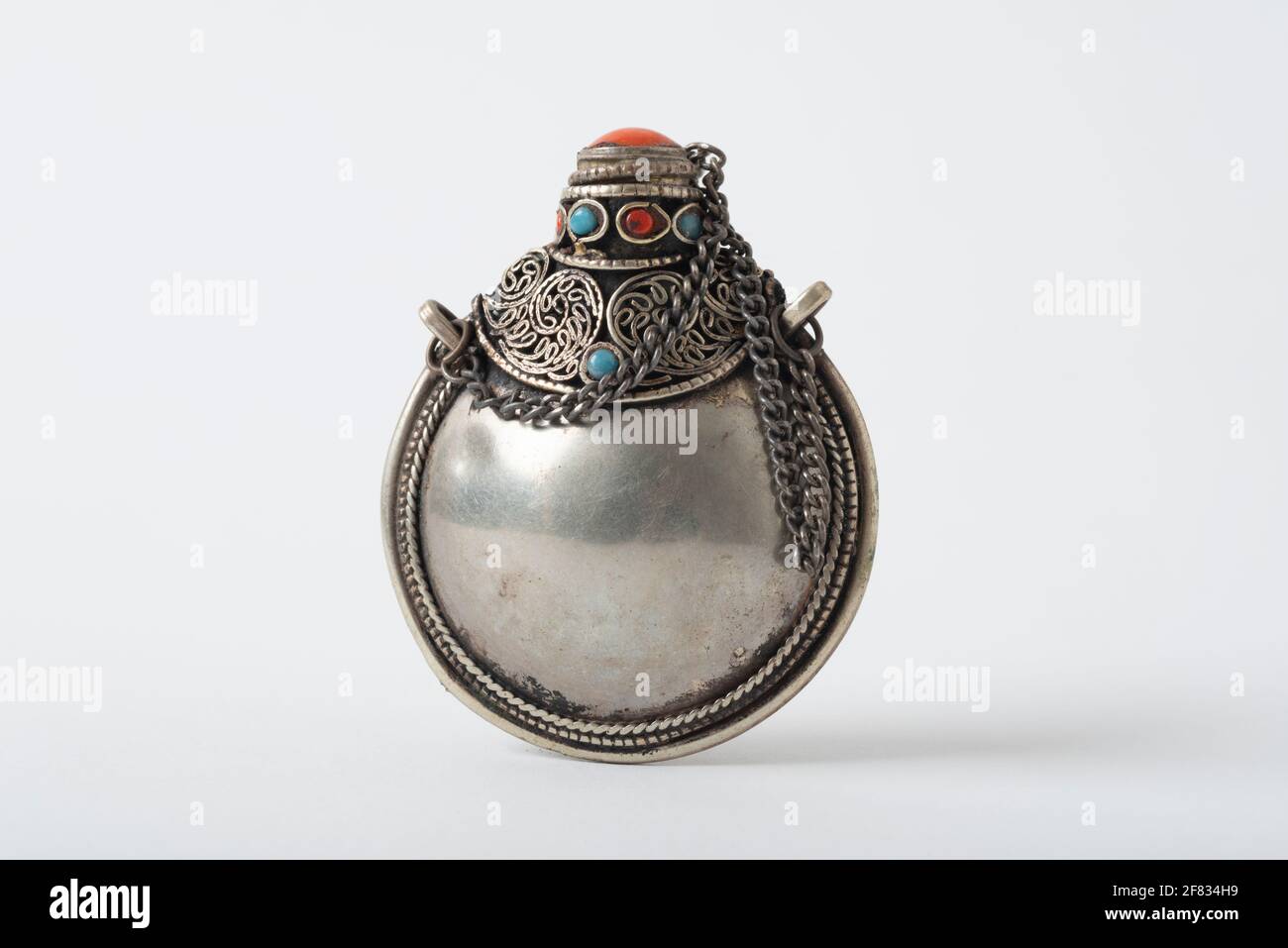 A small, antique snuff container collected in Bhutan, but of Tibetan ...