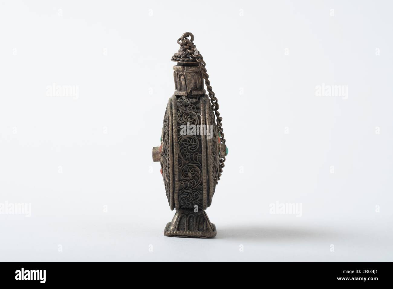 A small, antique snuff container collected in Bhutan, but of Tibetan ...