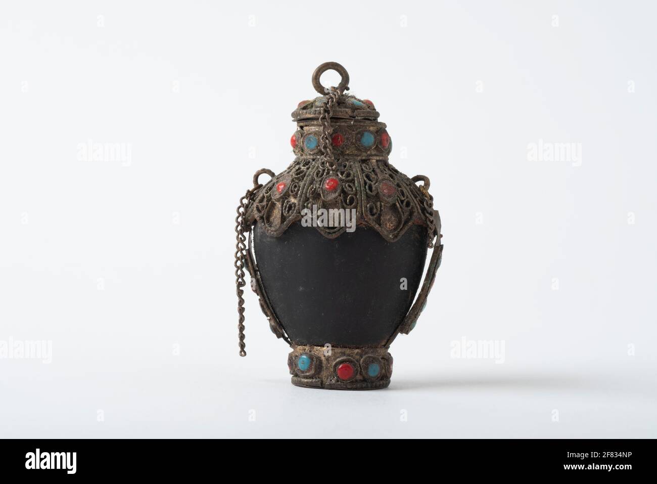 A small, antique snuff container collected in Bhutan, but of Tibetan ...