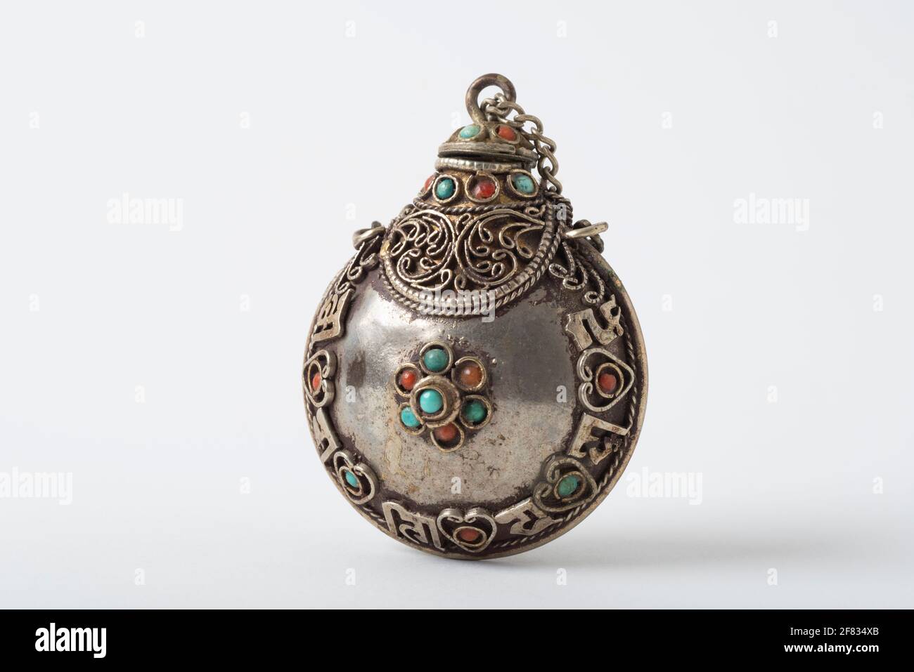 A small, antique snuff container collected in Bhutan, but of Tibetan ...