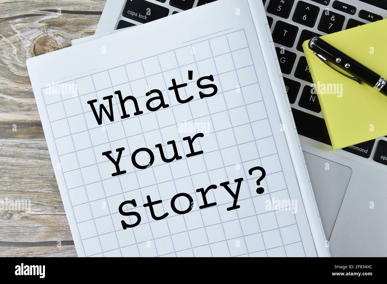Notebook written with text WHAT'S YOUR STORY Stock Photo - Alamy