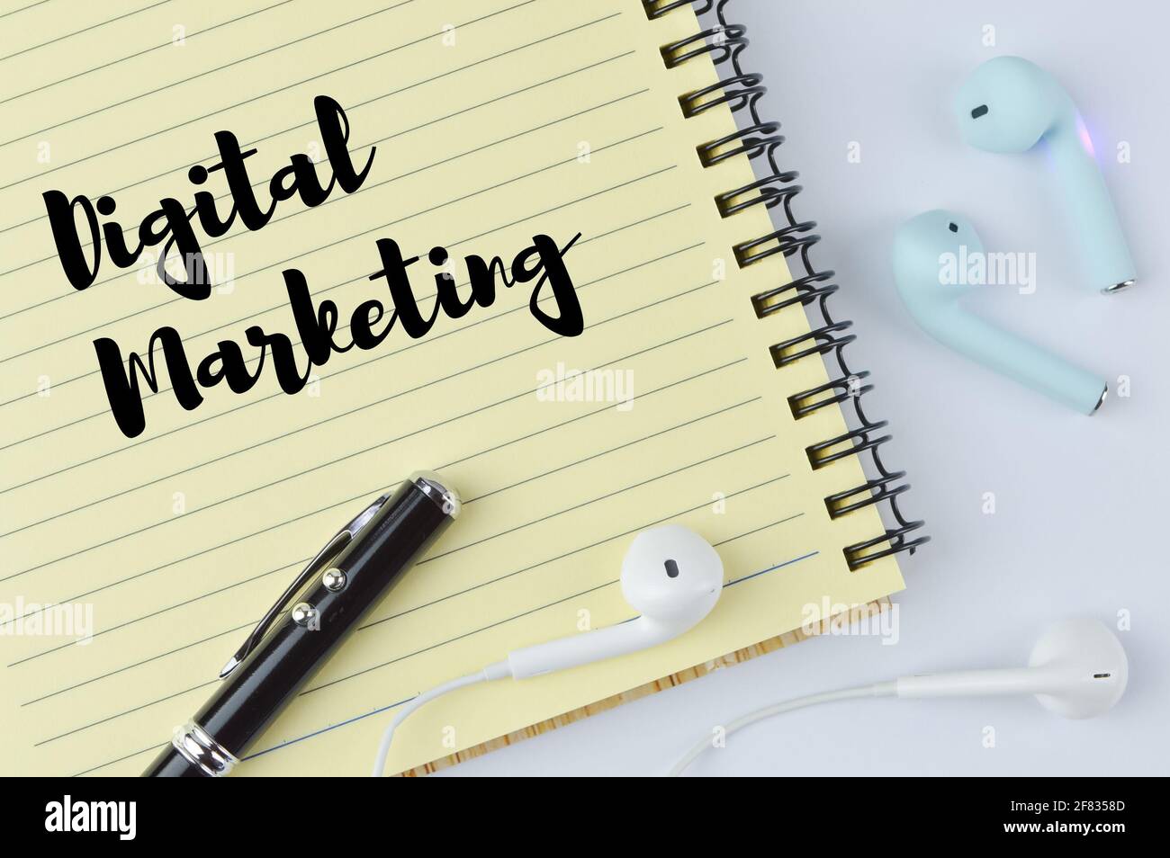 Notebook written with text DIGITAL MARKETING Stock Photo - Alamy