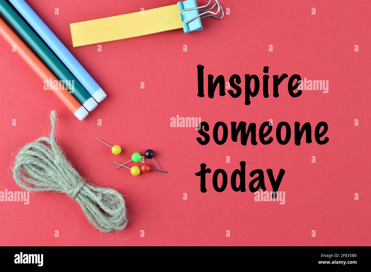 Red background written with INSPIRE SOMEONE TODAY Stock Photo - Alamy