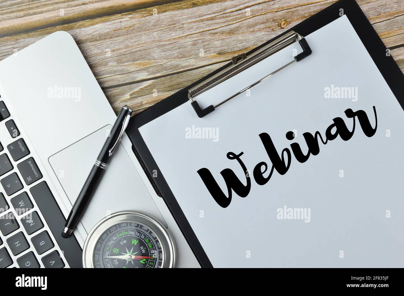 Top view of pen, compass and file written with WEBINAR Stock Photo - Alamy