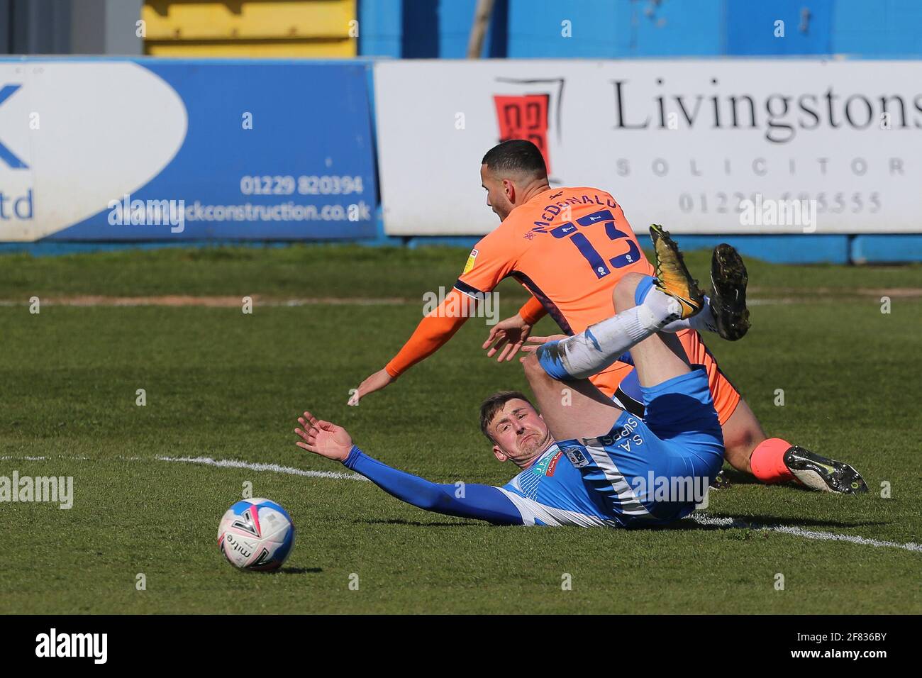 BARROW IN FURNESS, ENGLAND: Rod McDonald of Carlisle United battles ...