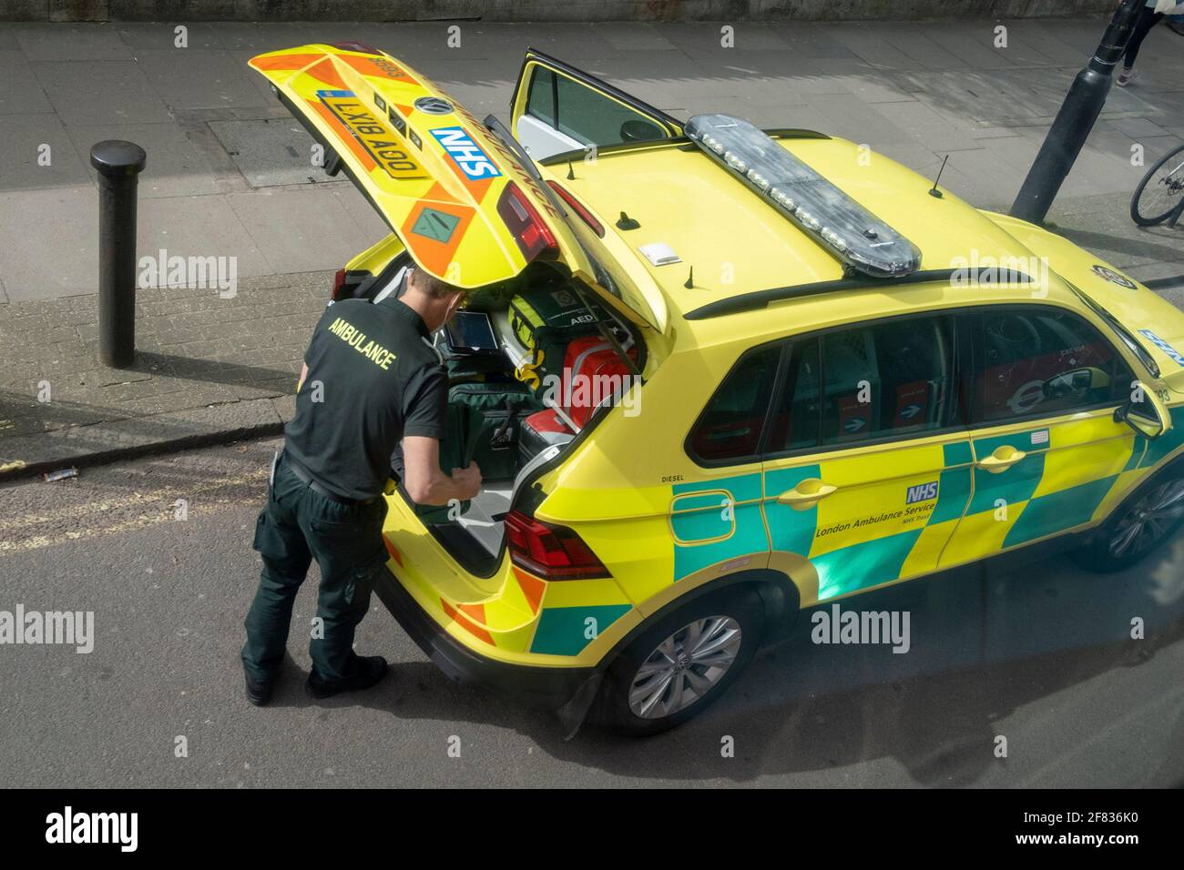 A Paramedic doctor attends to his equipment outside King's College ...