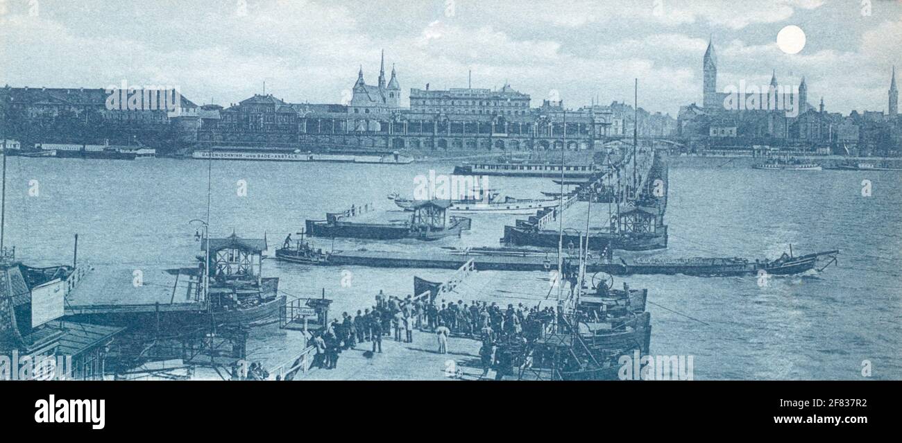A historical view of a pontoon bridge over the Rhine open to let a ...
