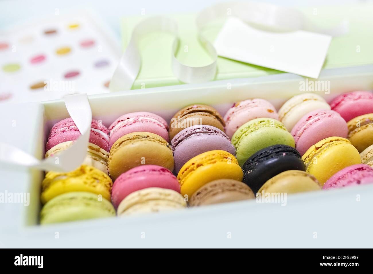 Assorted colorful Macaron cakes in box Stock Photo - Alamy