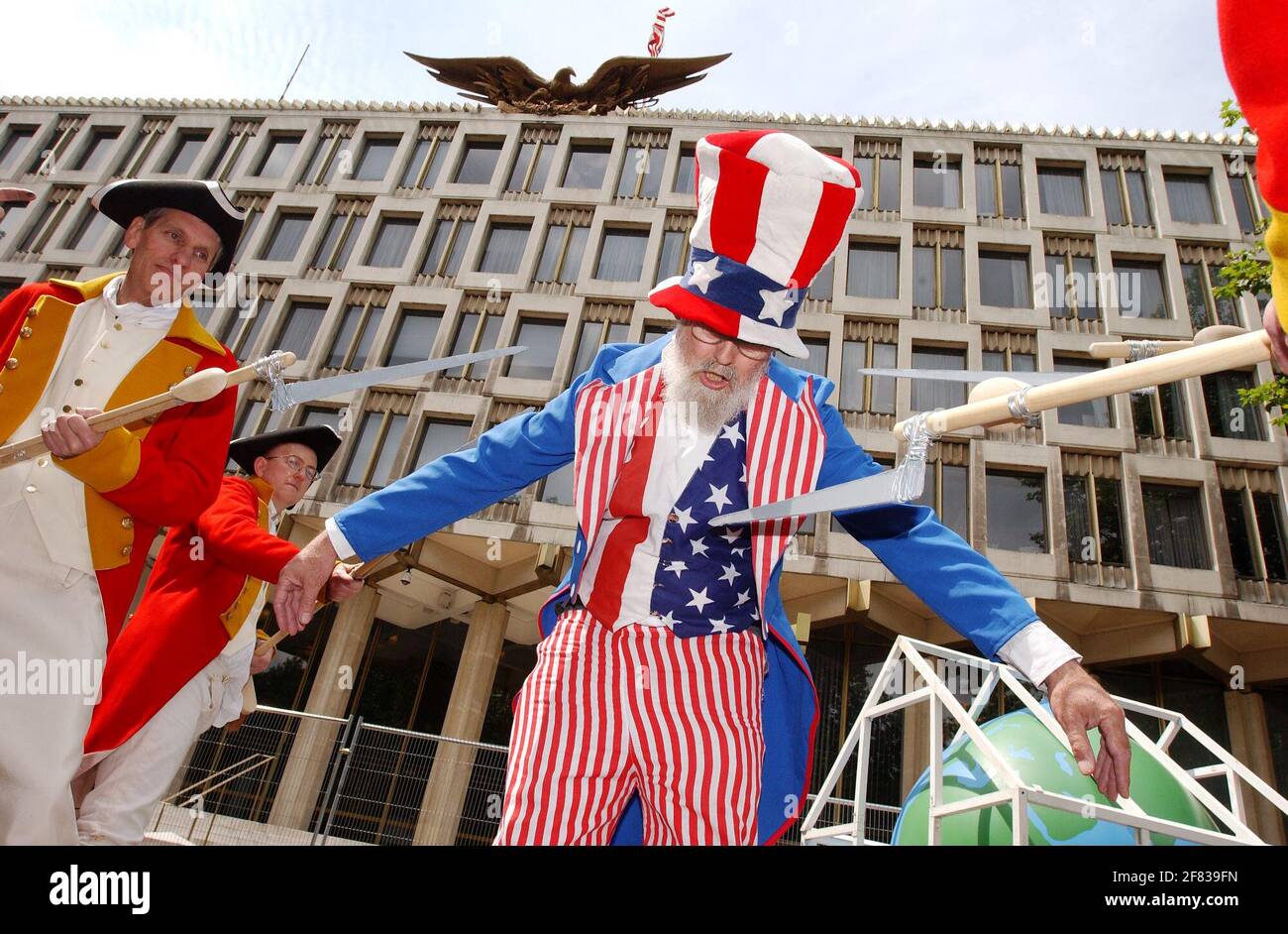 A mock Uncle Sam gets punished for Americas treatment of the globe by ...