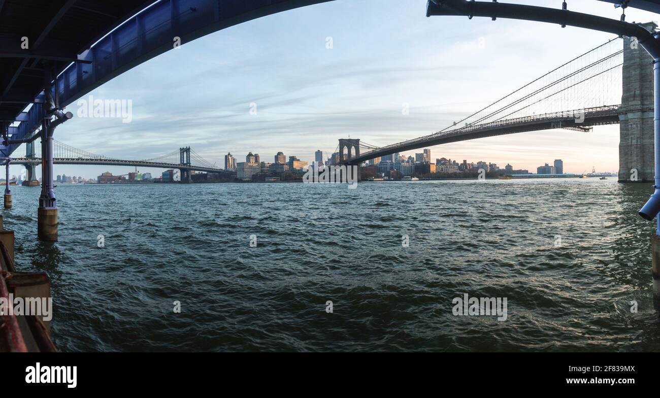 Wide view of a bridge over the water in a urban environment Stock Photo ...