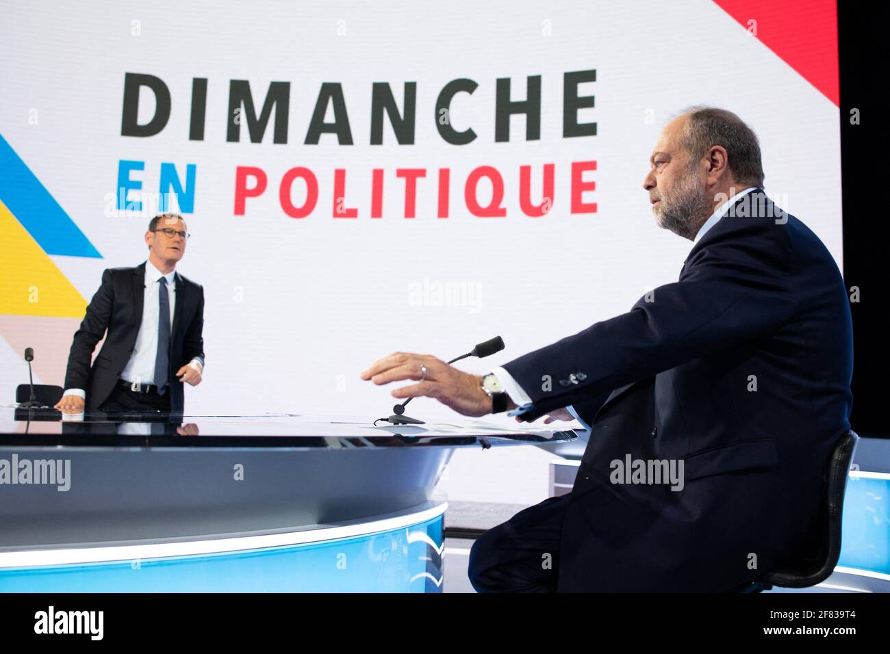 French journalist Francis Letellier and French Justice Minister Eric ...