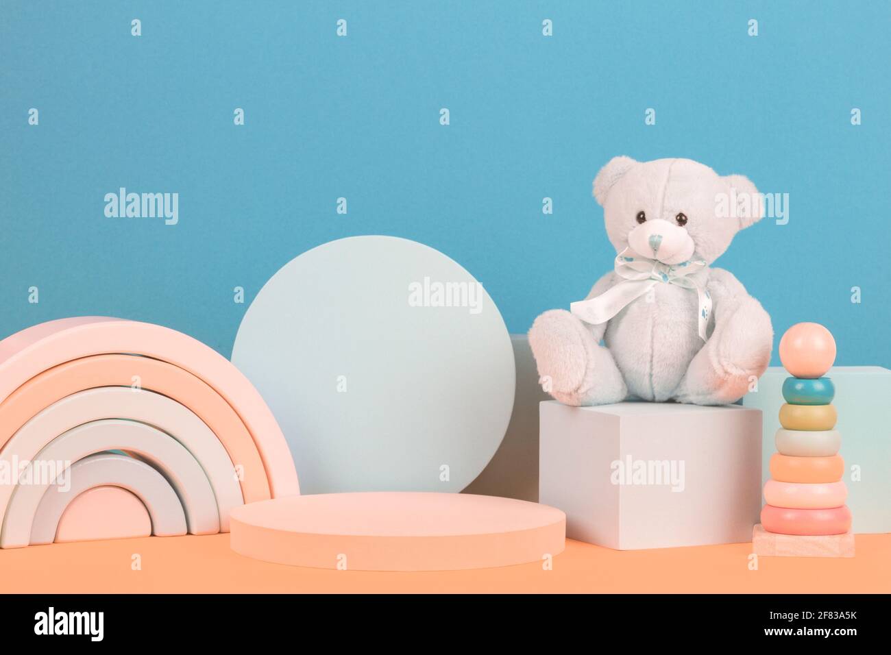 Baby kid toy background. Colorful wooden toys, teddy bear and geometric ...