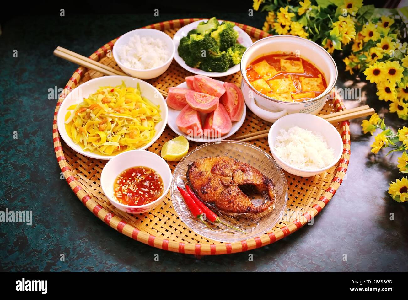 Family food set (Vietnamese style) on bamboo tray Stock Photo - Alamy