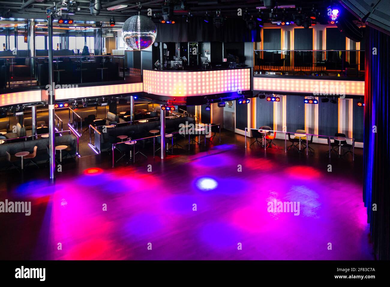 Empty dance floor of the club in one of the car ferries between ...