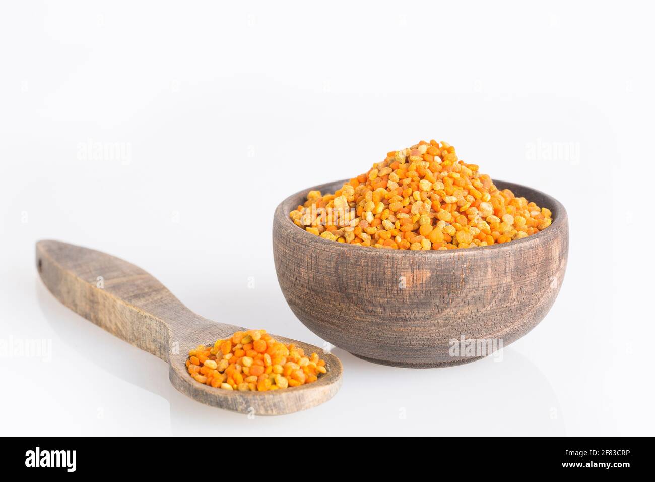 Bee pollen grains - White background Stock Photo - Alamy