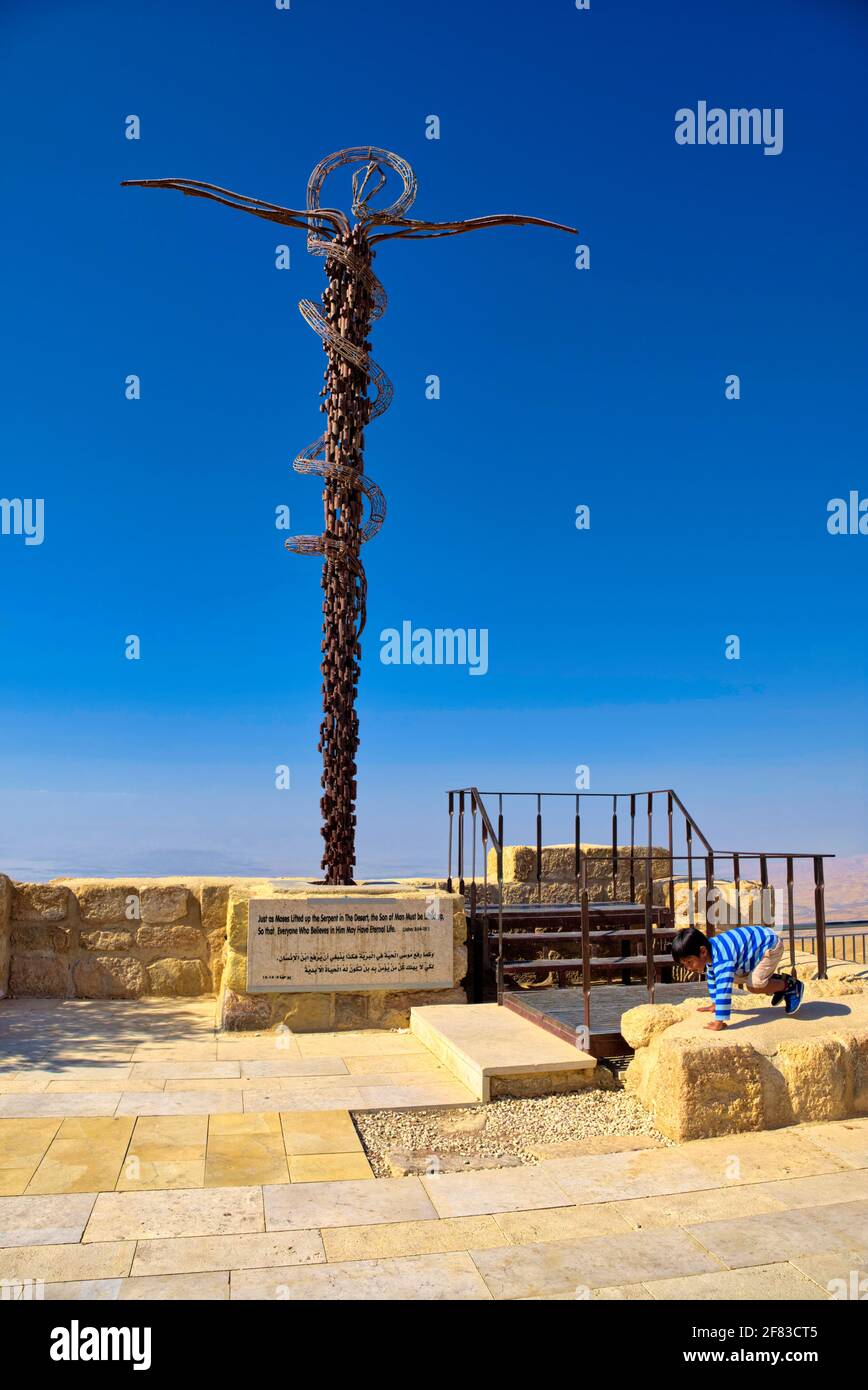 Outside the present-day shrine stands an enigmatic serpentine cross ...