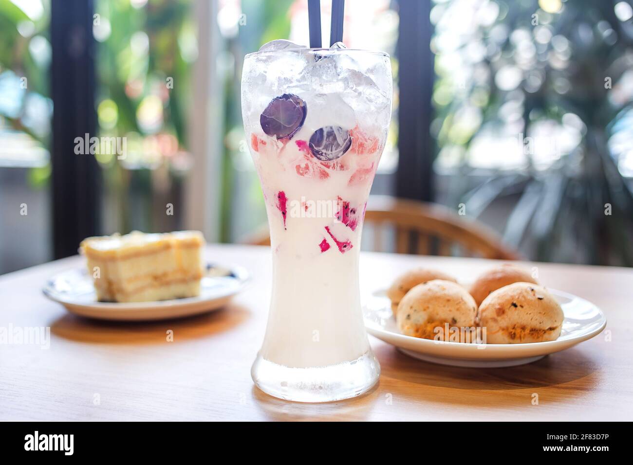Mixed yoghurt and fruits in glass Stock Photo - Alamy