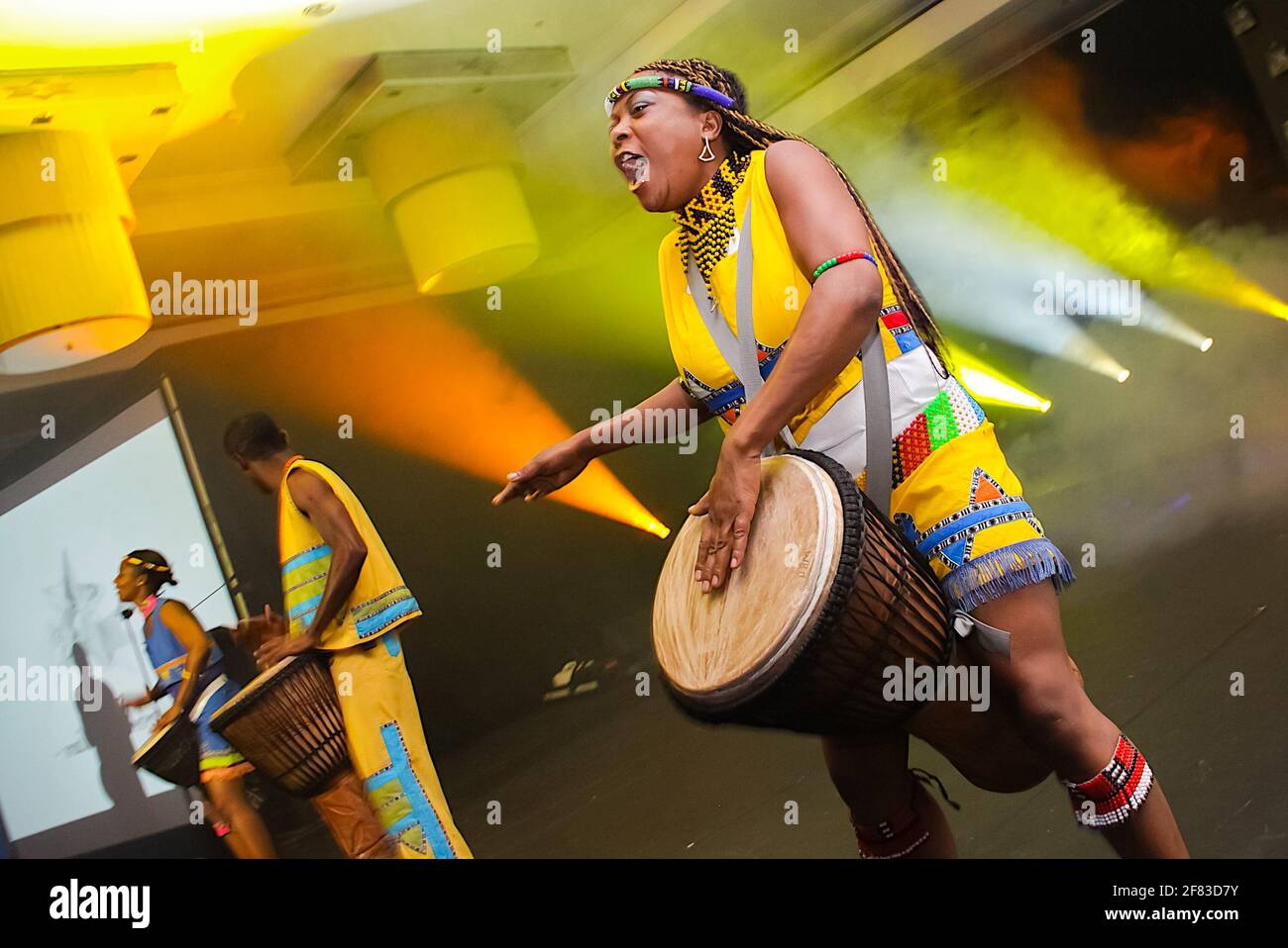 African Woman Playing Drums