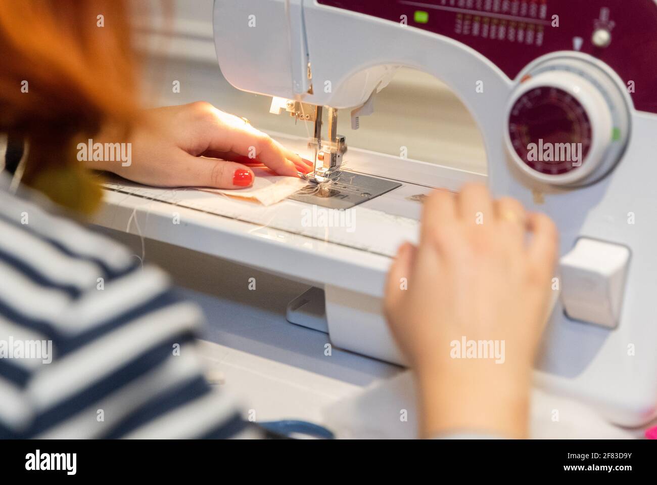 Seamstress sewing machine hi-res stock photography and images - Alamy