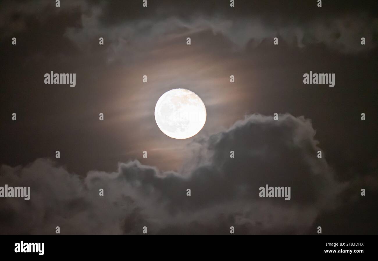 full moon in the sky with clouds landscape Stock Photo - Alamy