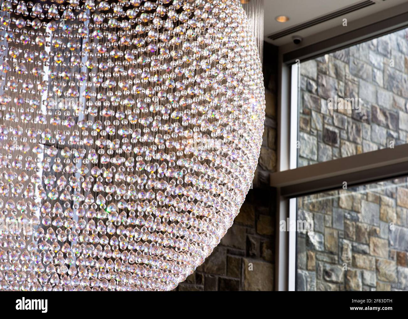 giant round structure made with crystals next to a window Stock Photo ...