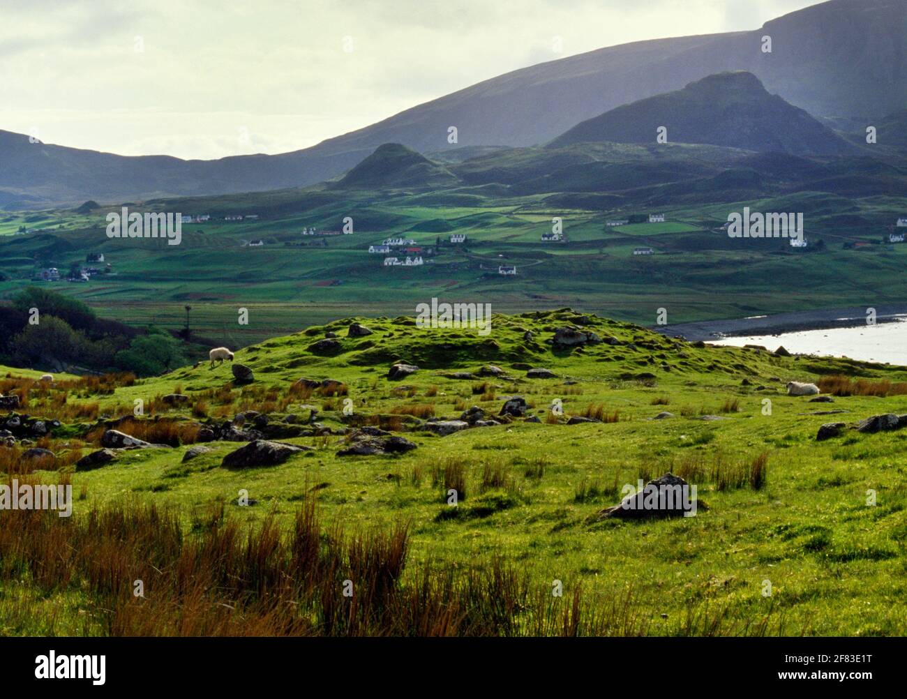 The remains of Carn Ban, a ruined round cairn or broch above Staffin ...