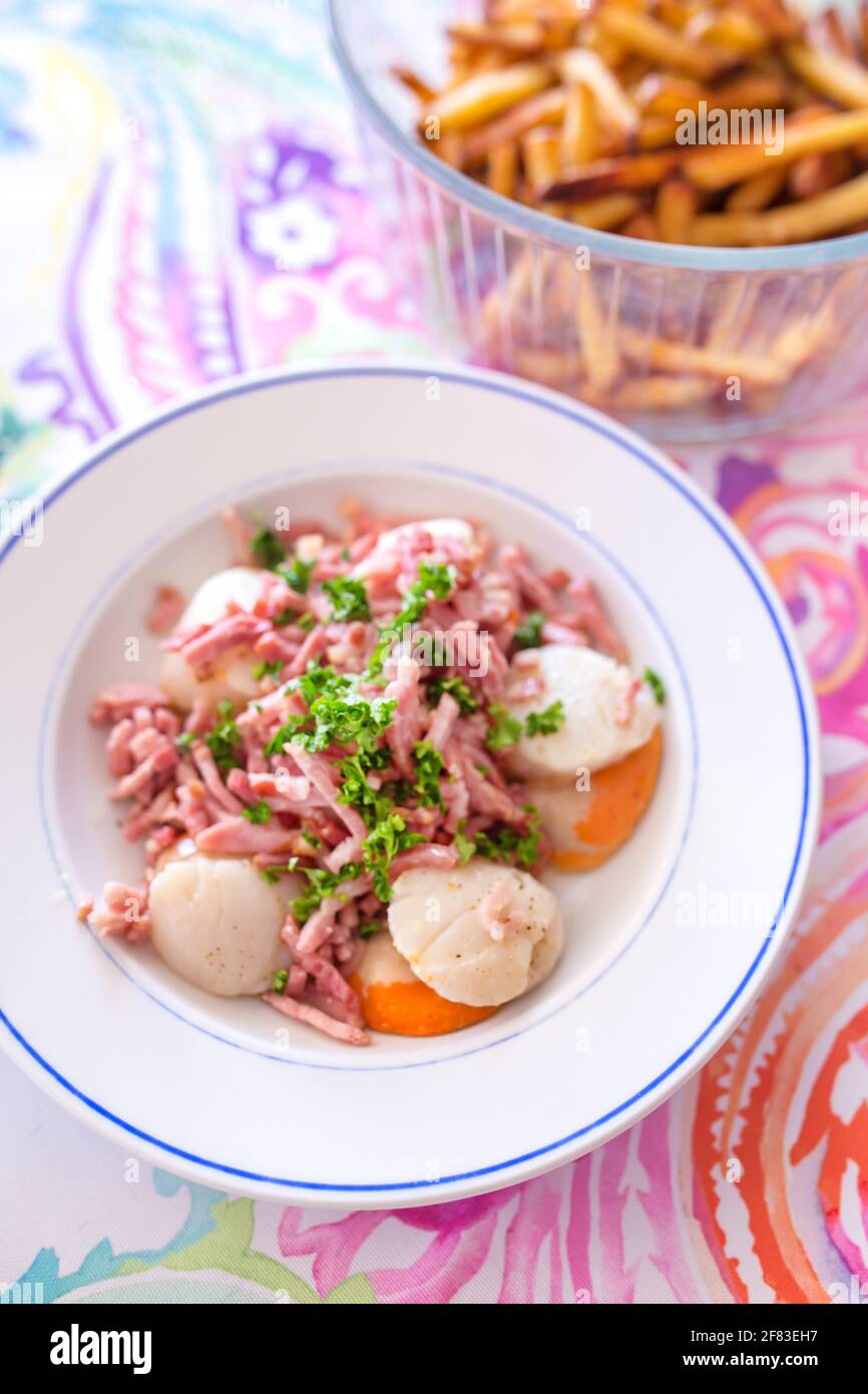 Cooked big size scallops with ham Stock Photo - Alamy