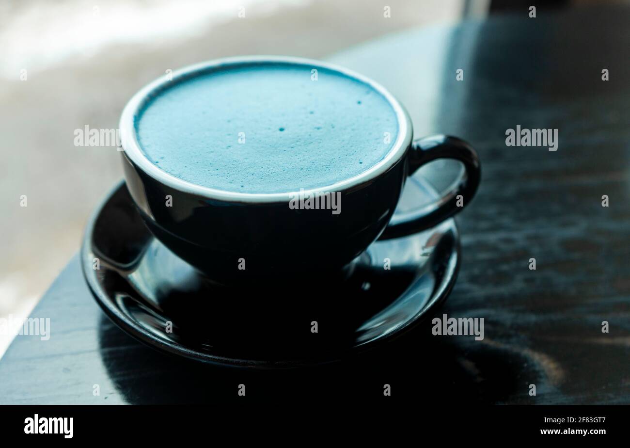 prepared matcha tea in a clear glass. a delicious drink made from ...