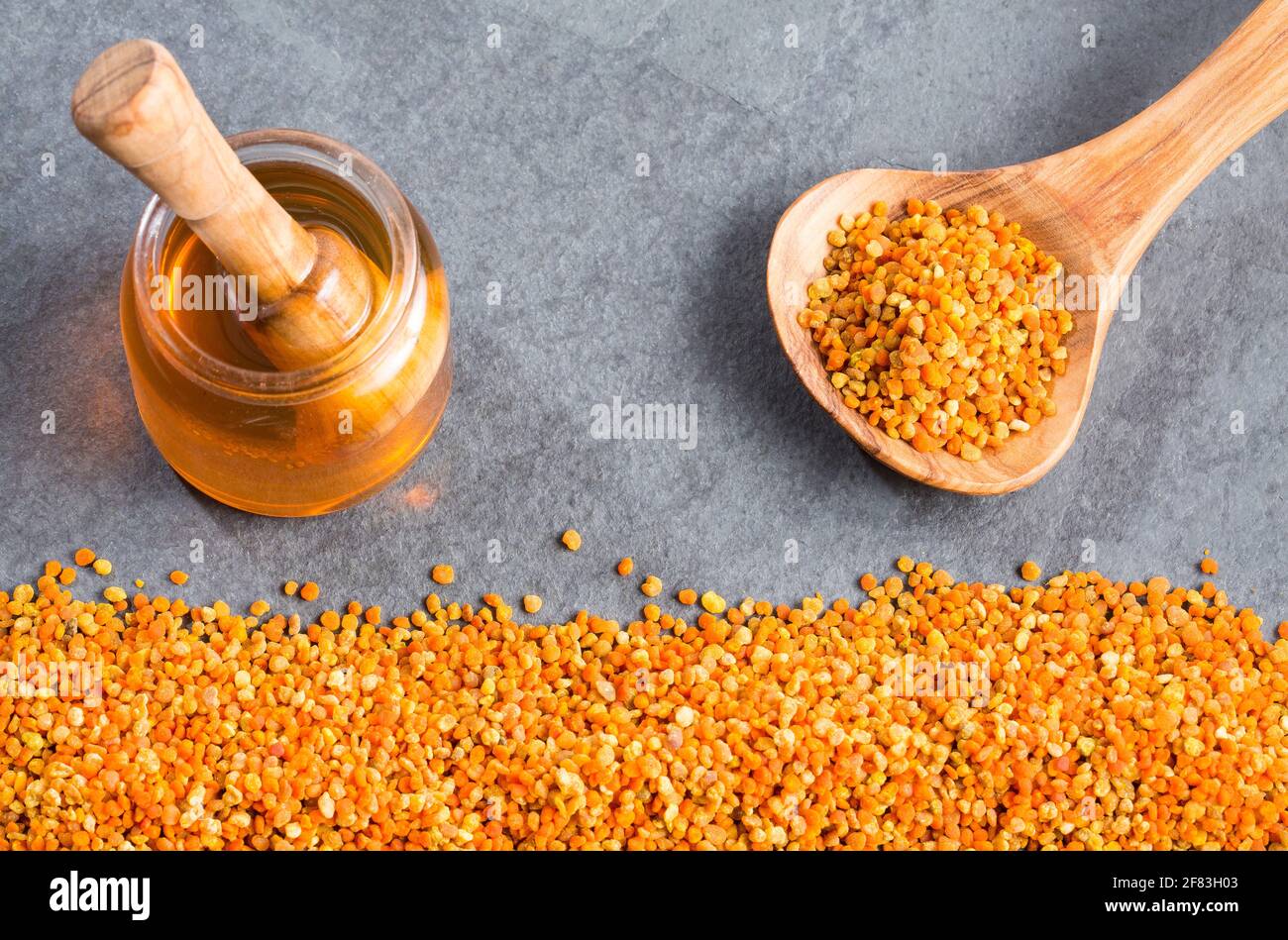 Granulated pollen and natural honey Stock Photo - Alamy