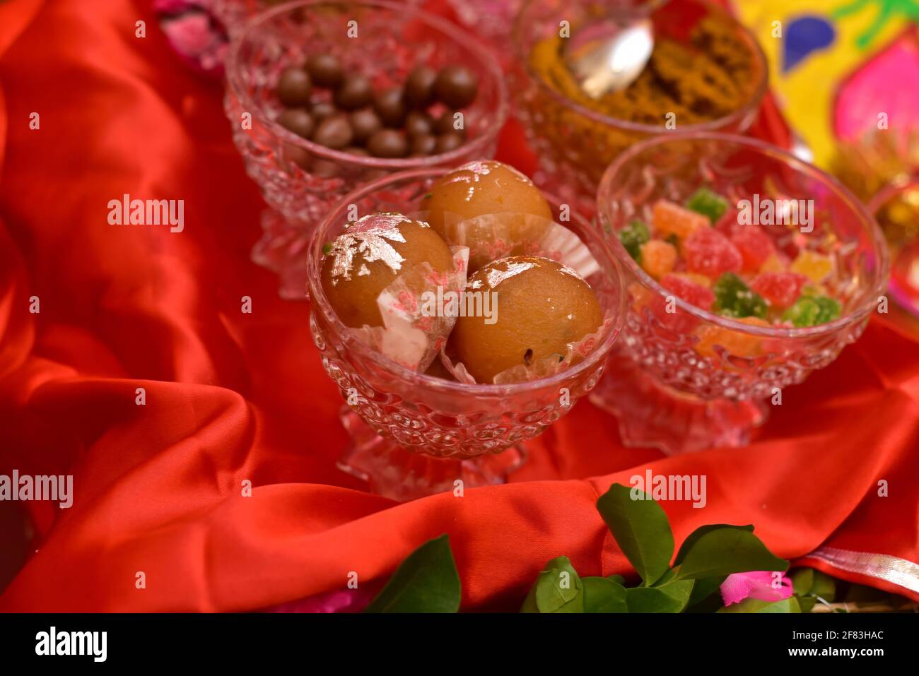 A closeup shot of various sweets in Indian wedding rituals Stock Photo ...