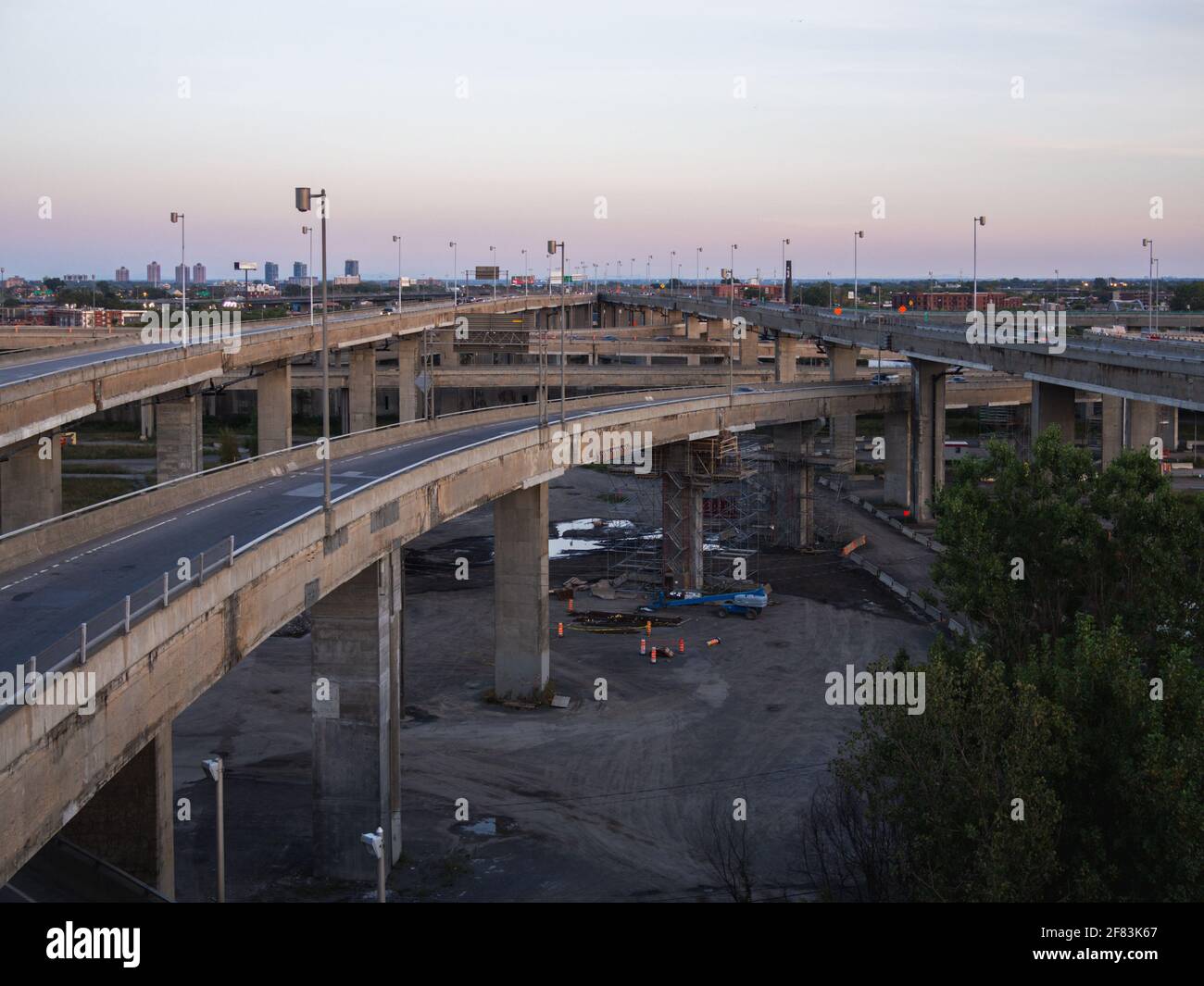 high angle view of street bridges crossing in the distance in summer ...