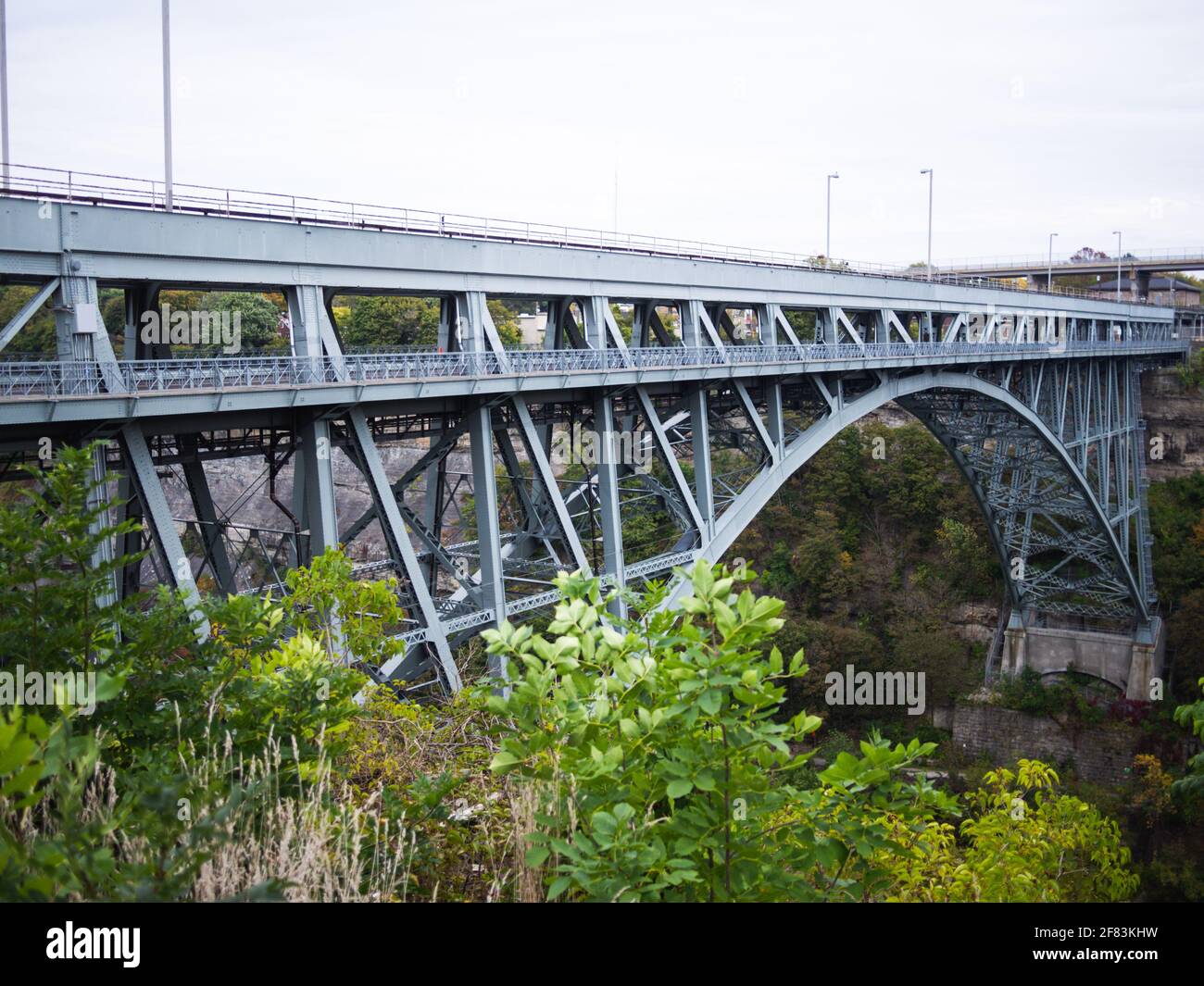 two bridges made out of steel over the water at a country border Stock ...