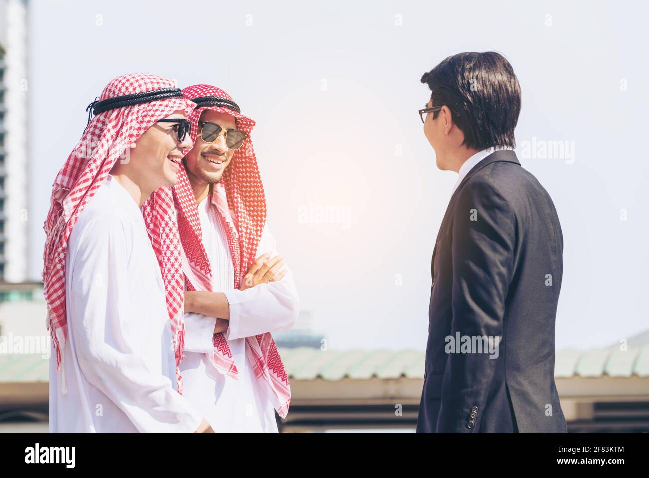 Arabic, Asian businessmen discussion in business meeting. Modern city ...