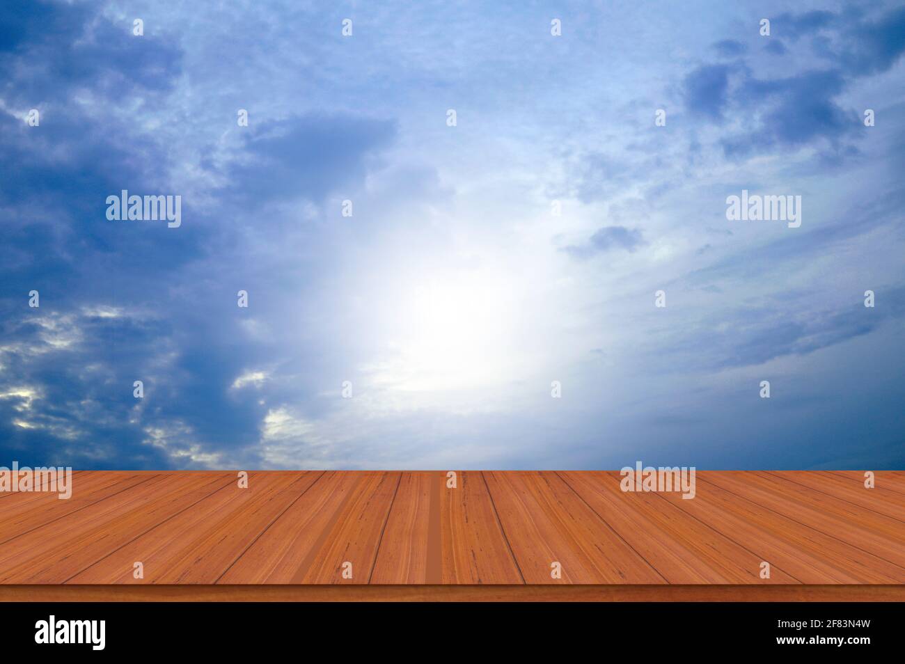 Wood table top in blue sky with sunlight backgrounds Stock Photo - Alamy
