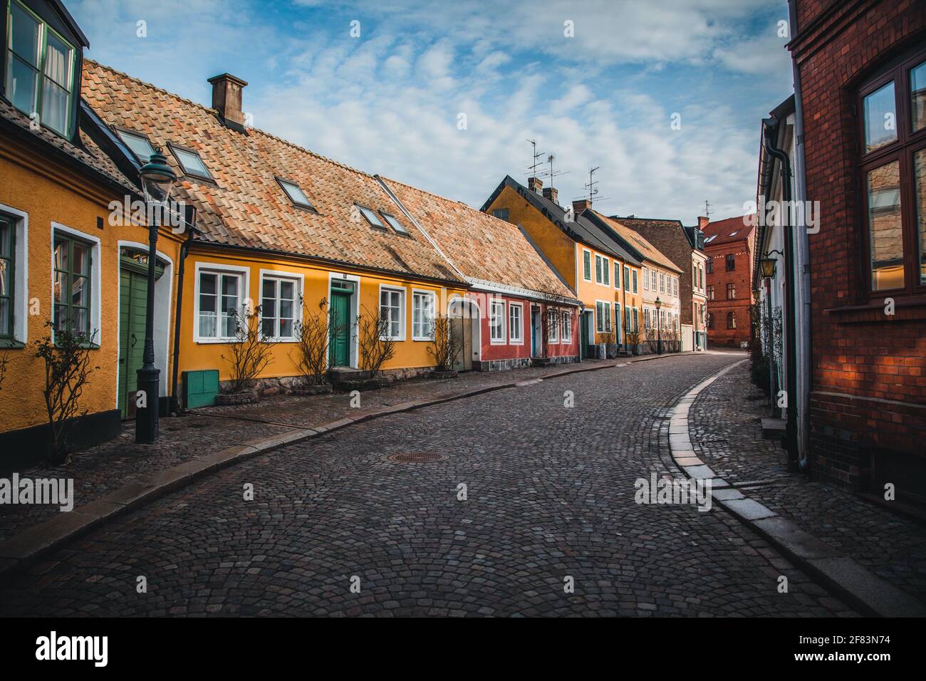 View down the cobblestone streets in Lund, Sweden Stock Photo - Alamy