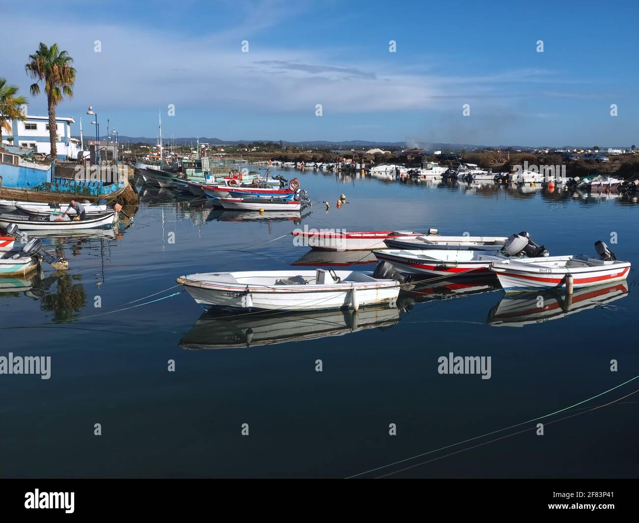 Fisher harbor of fuseta at the Algarve coast of Portugal Stock Photo ...
