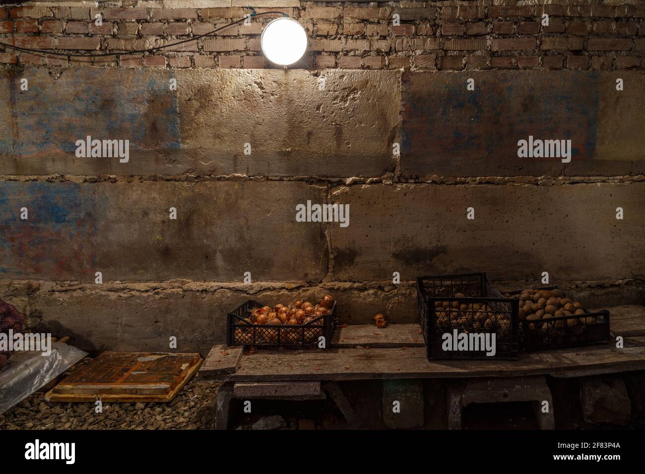 basement with few onion and potatoes storage Stock Photo - Alamy