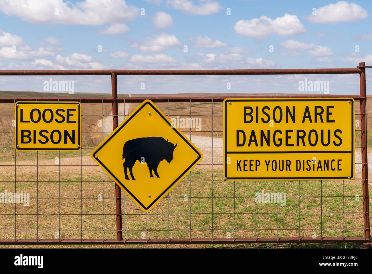 Bison warning signs at the Tall Grass Prairie Bison Preserve in ...