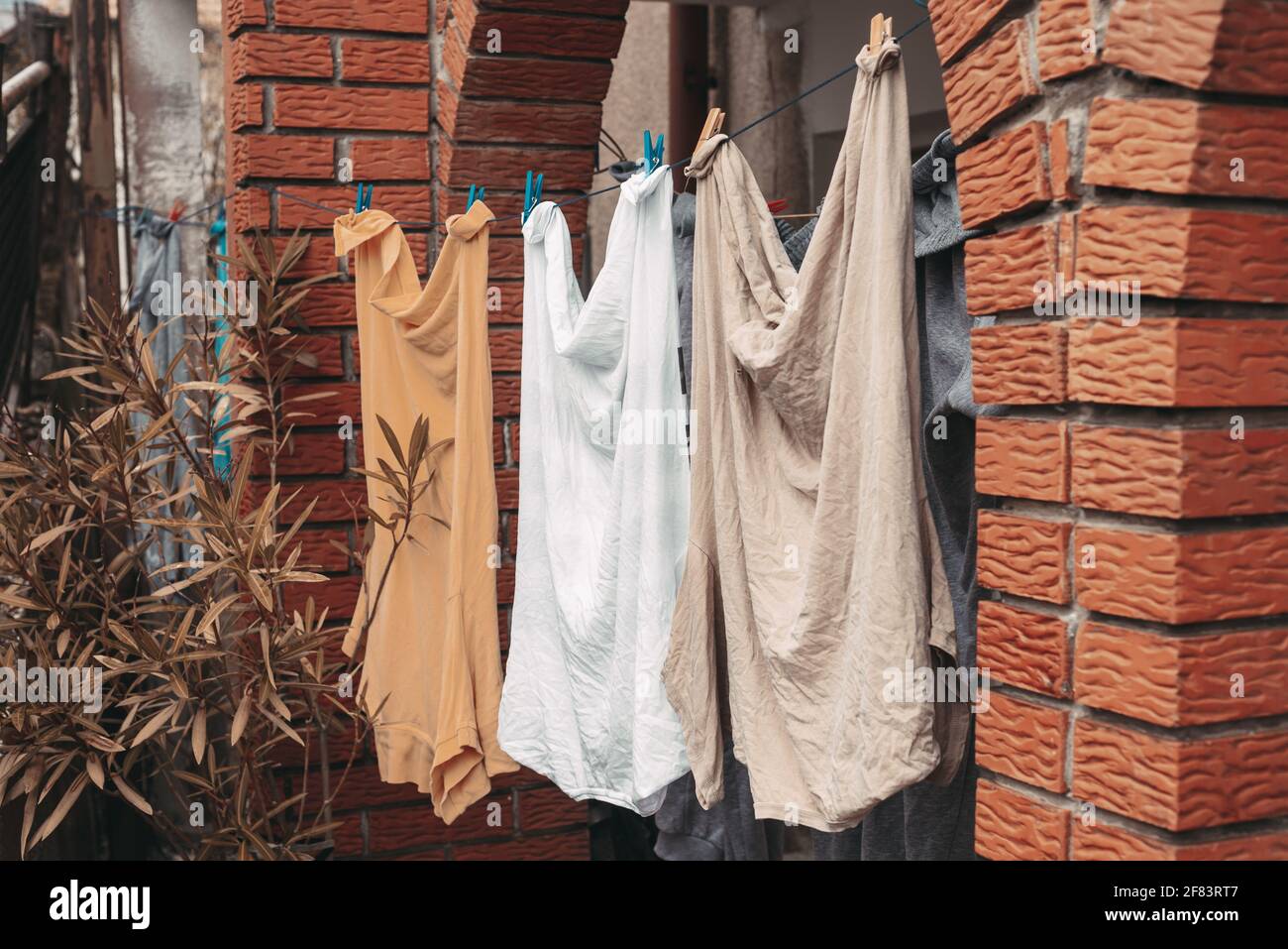 Hanging washing retro hi-res stock photography and images - Alamy