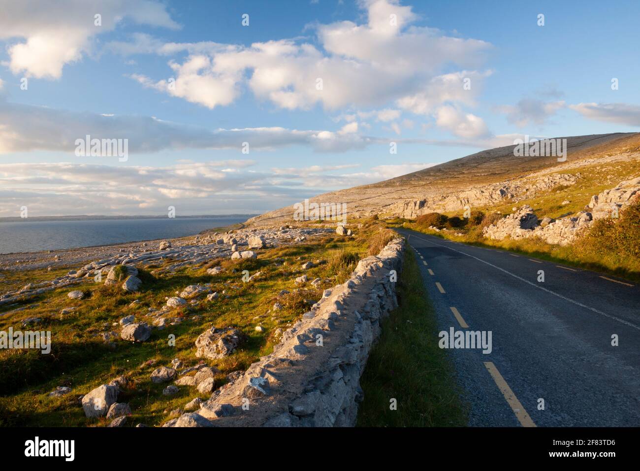 Coastal road in the Burren on the Wild Atlantic Way in County Clare in ...