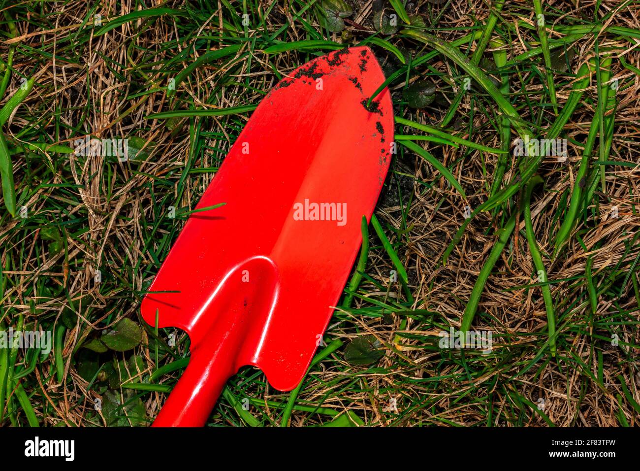 Shovel for working the earth on the ground. View from above. Preparing ...