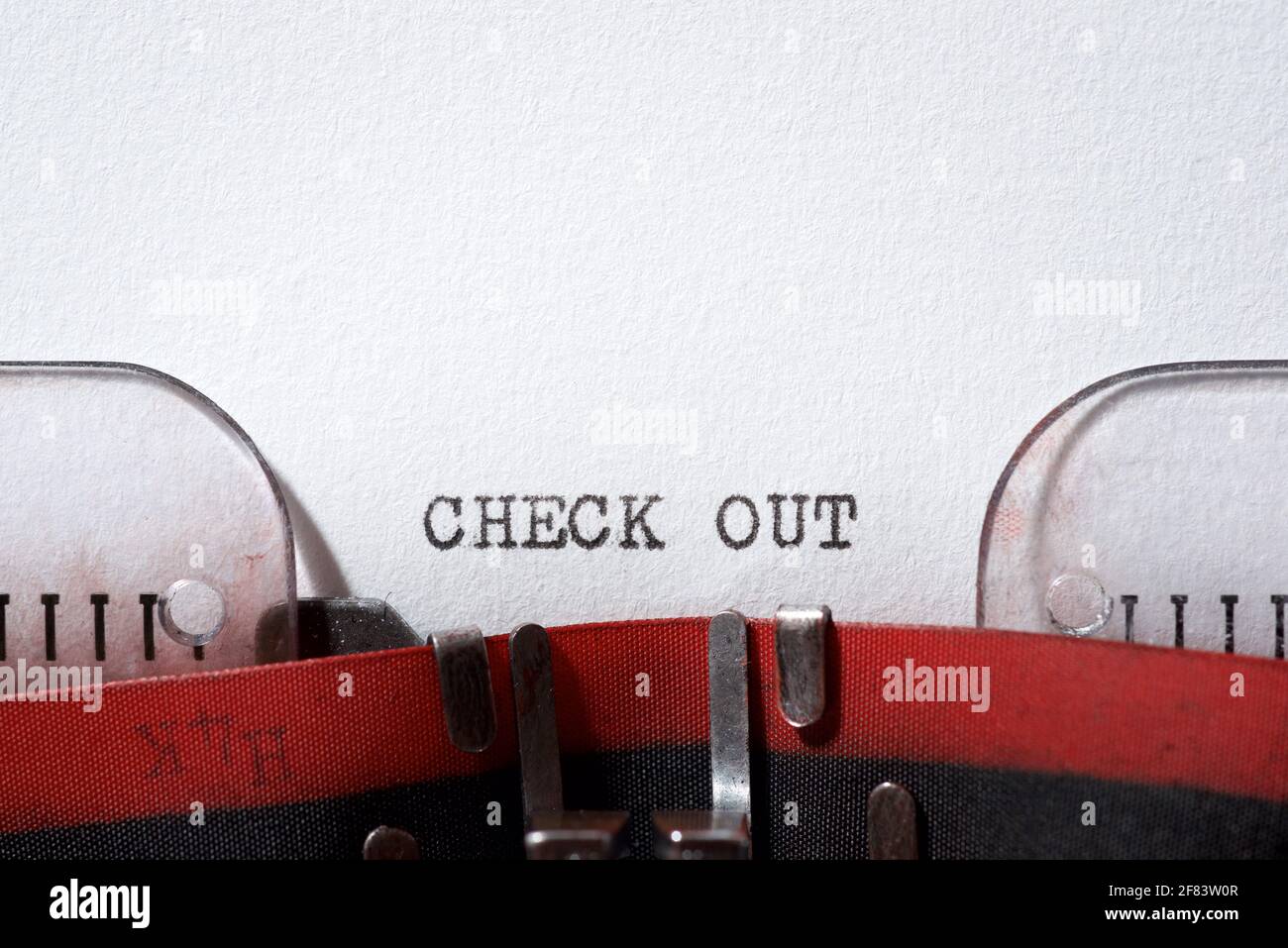 Check out word written with a typewriter Stock Photo - Alamy