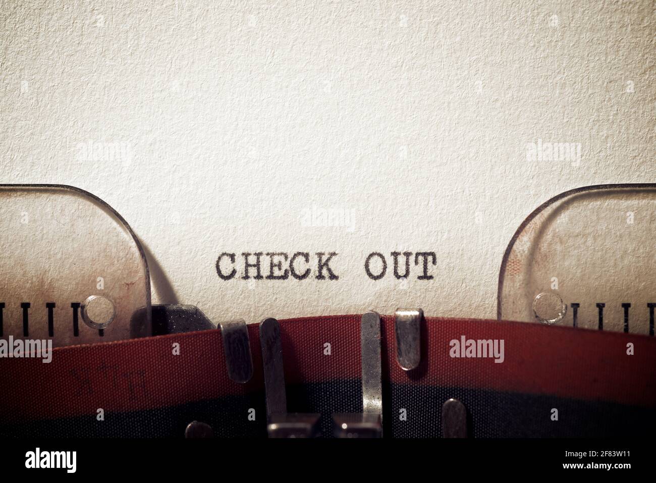 Check out word written with a typewriter Stock Photo - Alamy