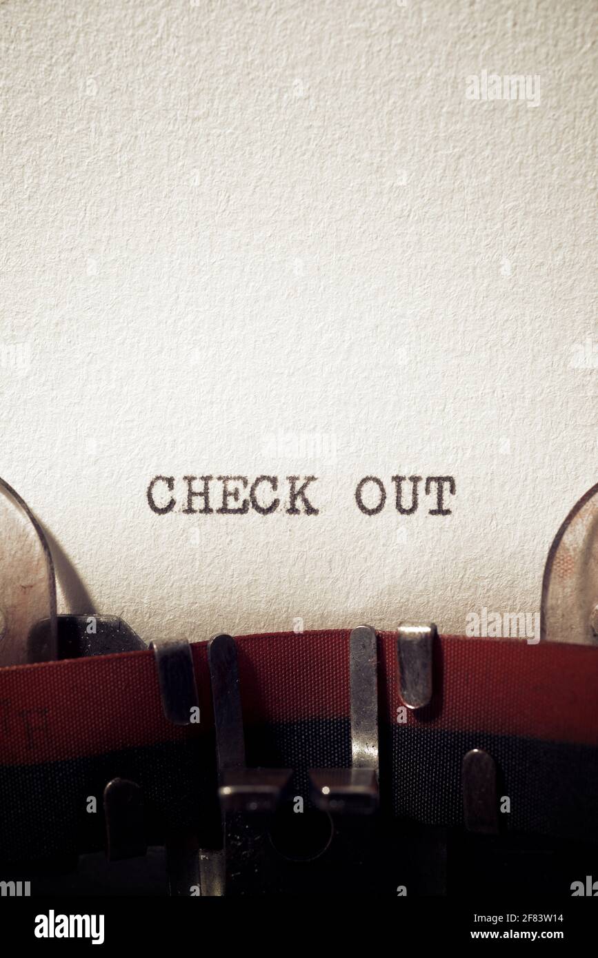 Check out word written with a typewriter Stock Photo - Alamy