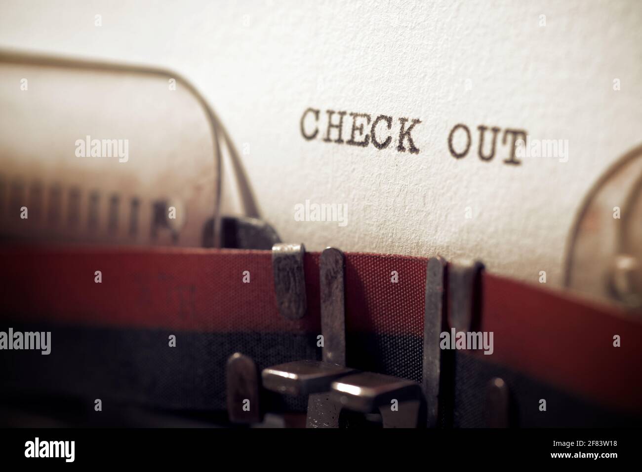 Check out word written with a typewriter Stock Photo - Alamy