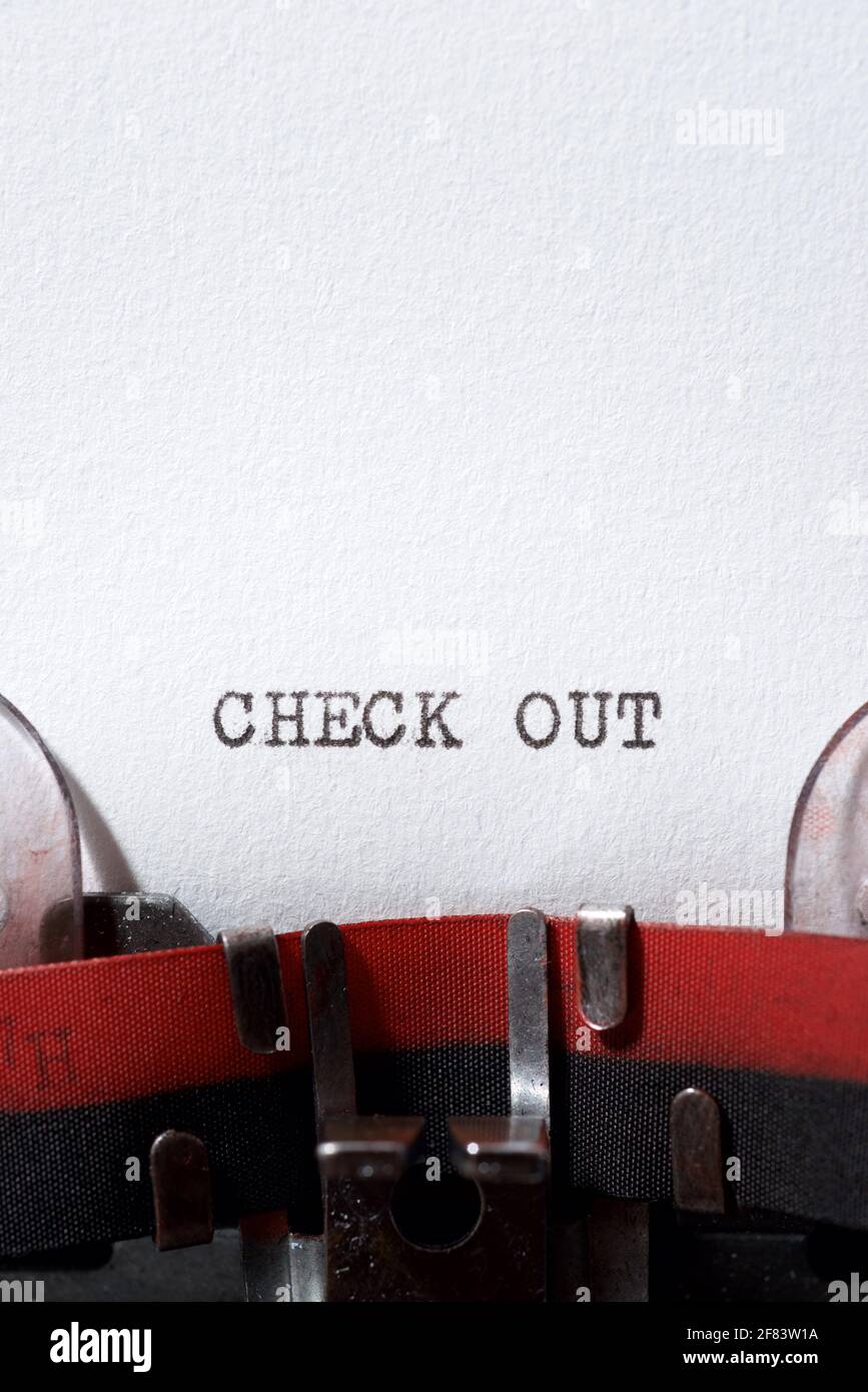 Check out word written with a typewriter Stock Photo - Alamy
