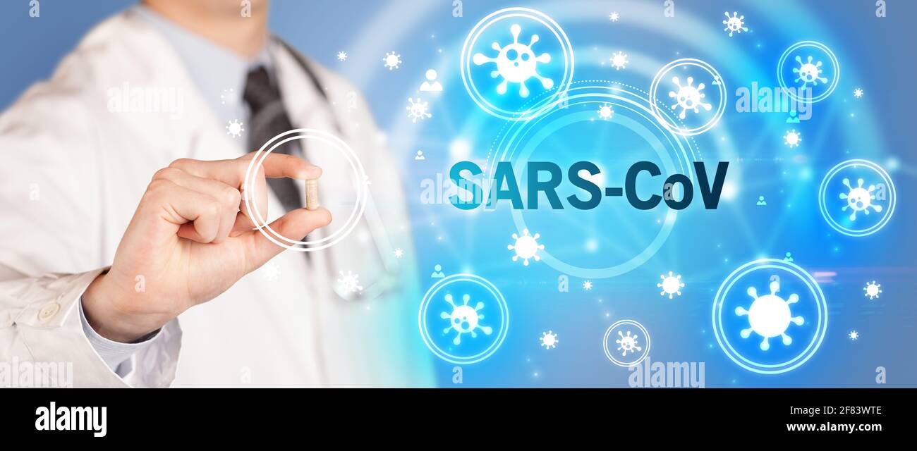 Doctor giving pill, virus concept Stock Photo - Alamy
