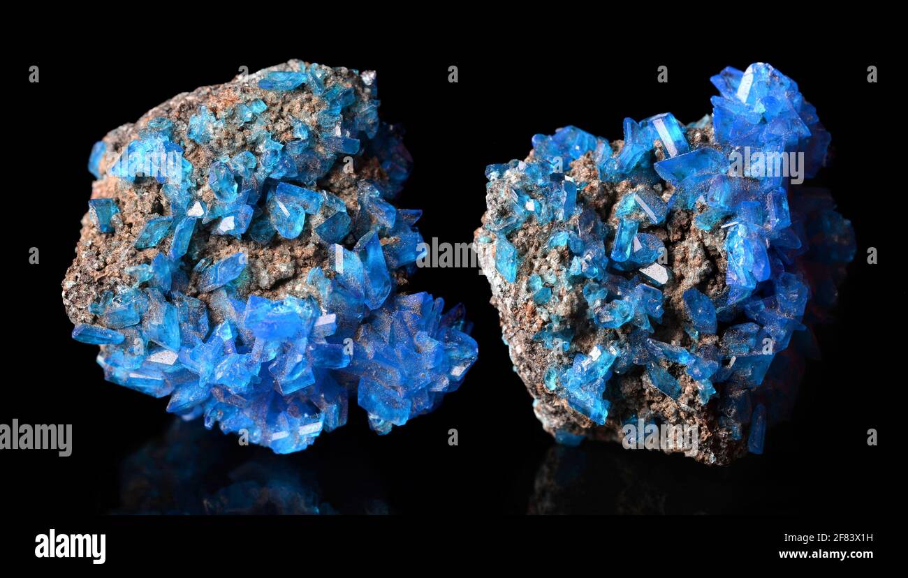 Blue mineral crystals Covellite on a black background Stock Photo - Alamy