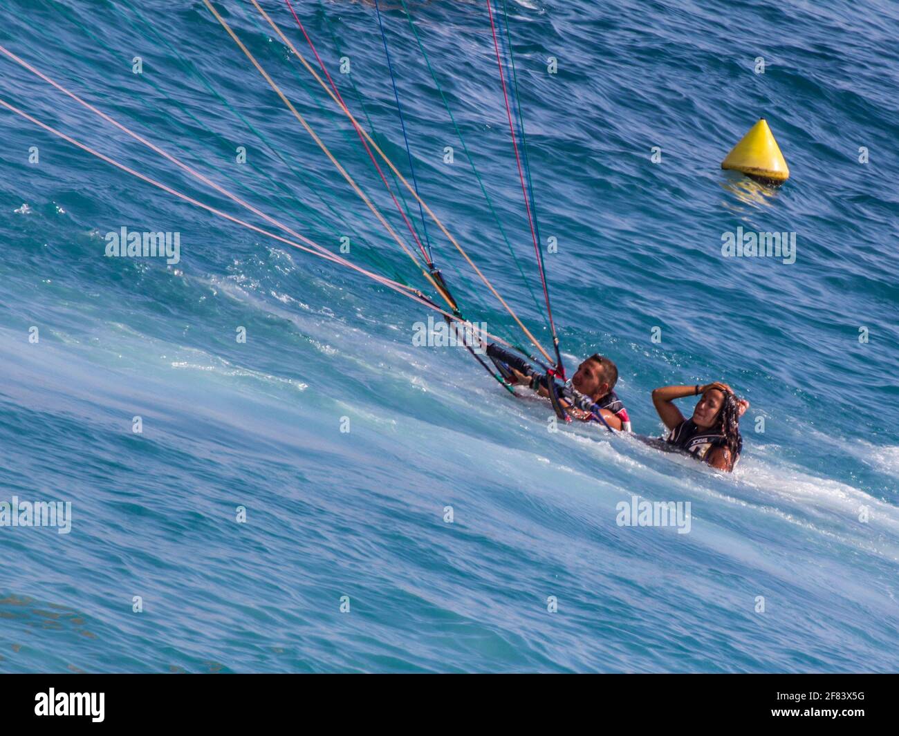 People practising water sports on the sea Stock Photo - Alamy